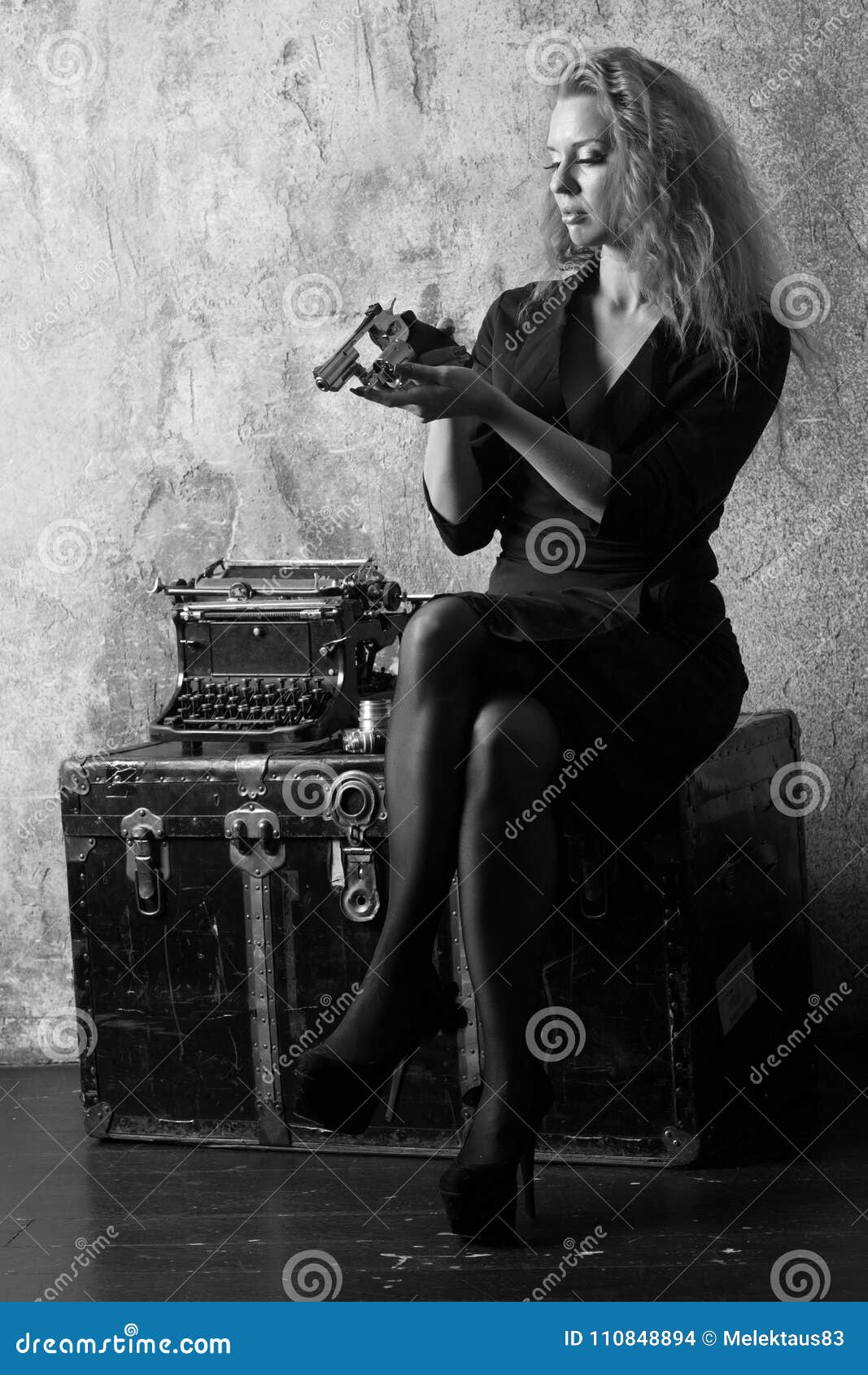 Woman with a revolver stock photo. Image of oldstyle - 110848894