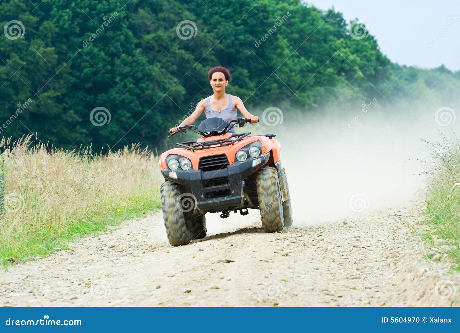 Woman riding ATV stock photo. Image of pretty, beauty - 5604970