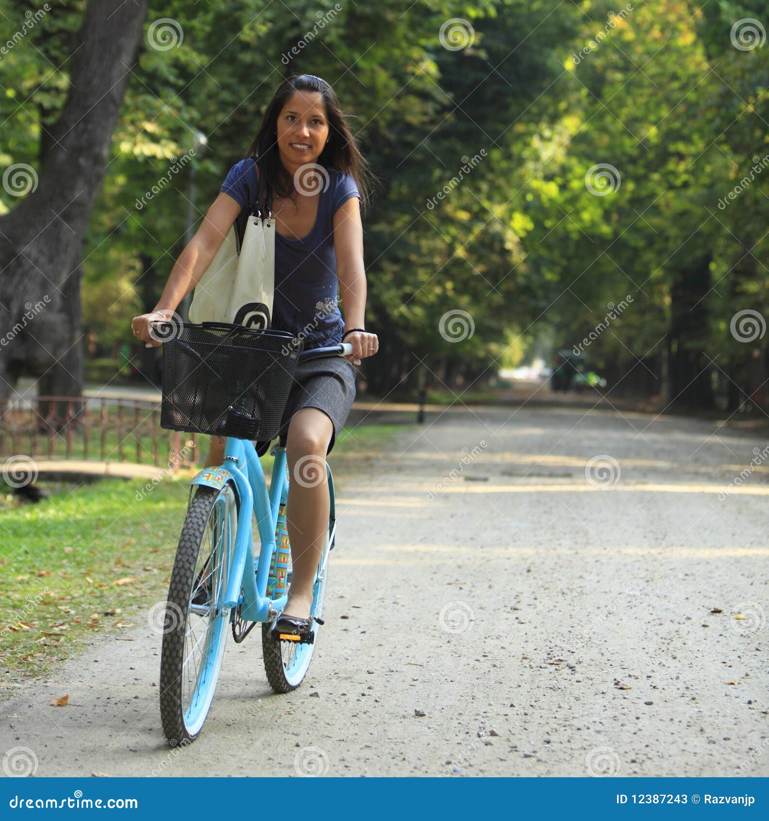 Woman Riding a Bicycle stock image. Image of adult, active - 12387243