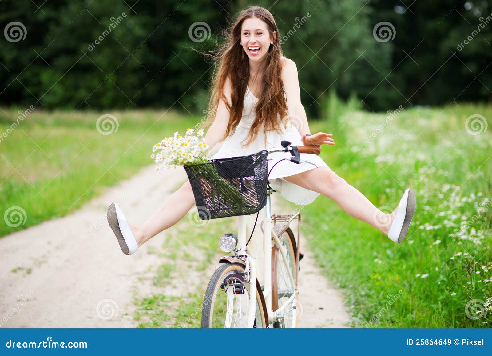 Woman Riding Bicycle With Her Legs In The Air Royalty Free Stock Images ...
