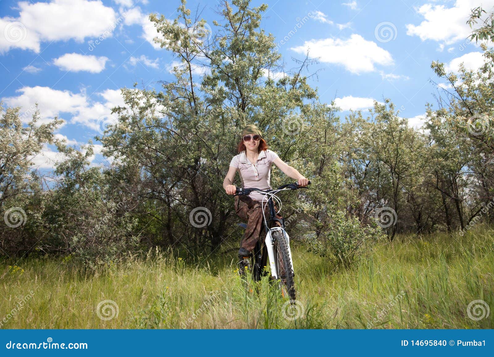 Woman riding bike stock photo. Image of bike, freeride - 14695840