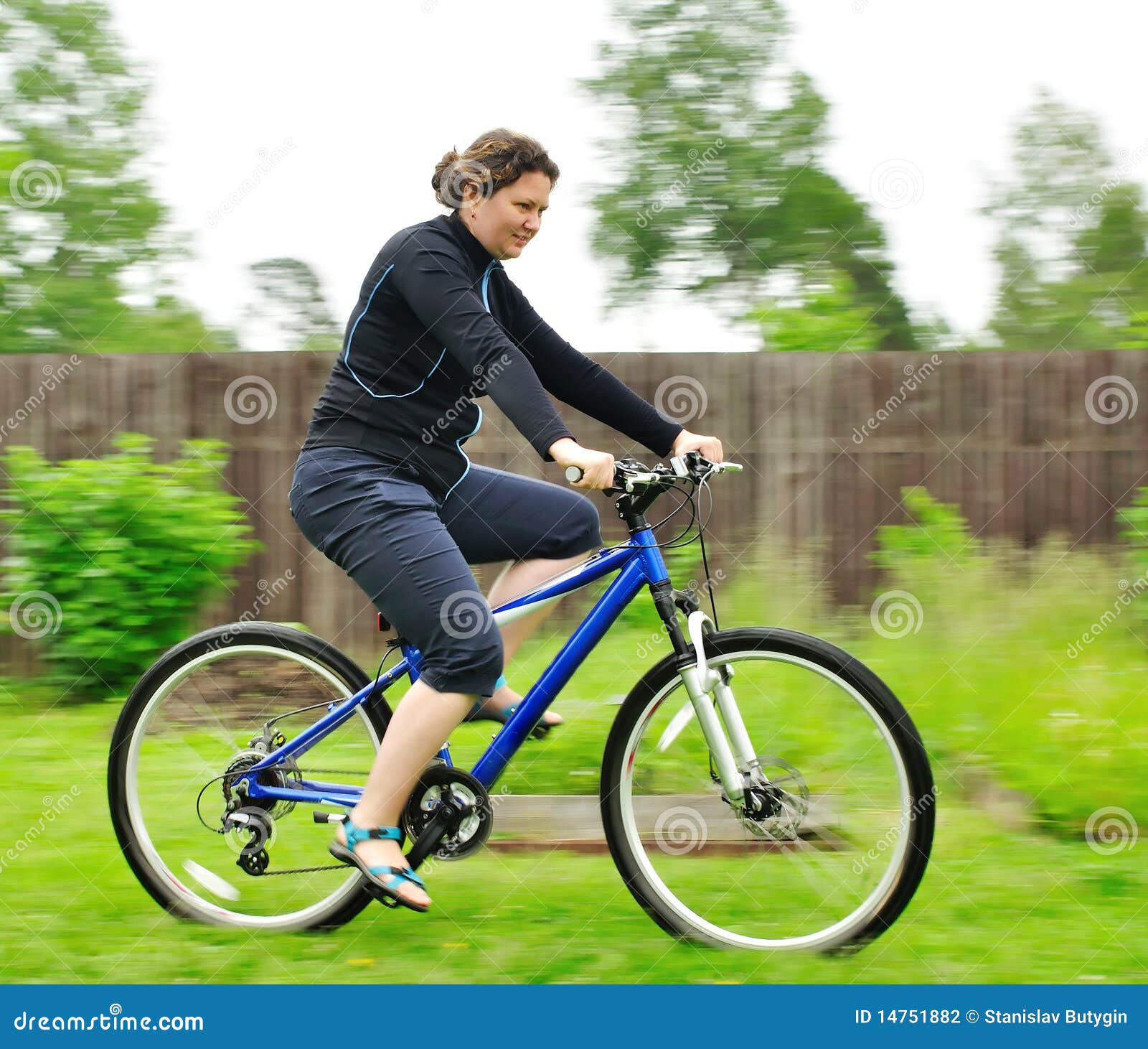 Woman riding the bike stock photo. Image of rural, white - 14751882