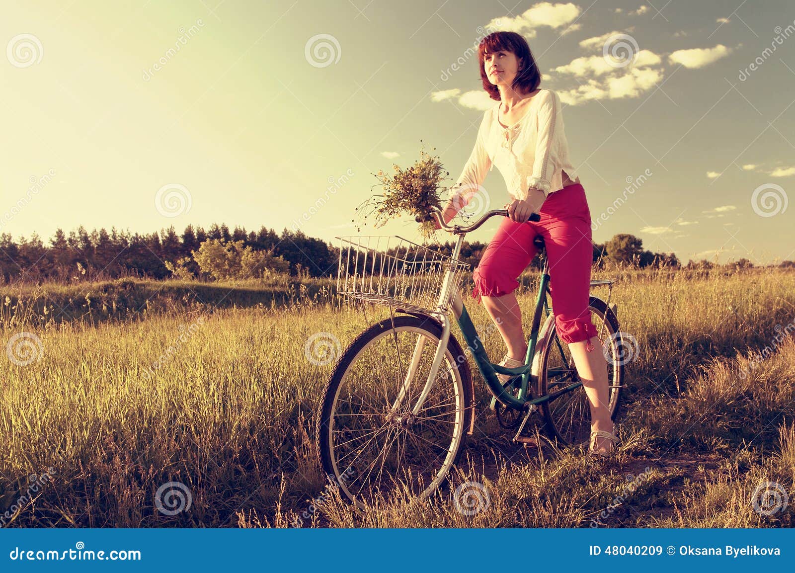 Woman riding bike stock image. Image of riding, female - 48040209