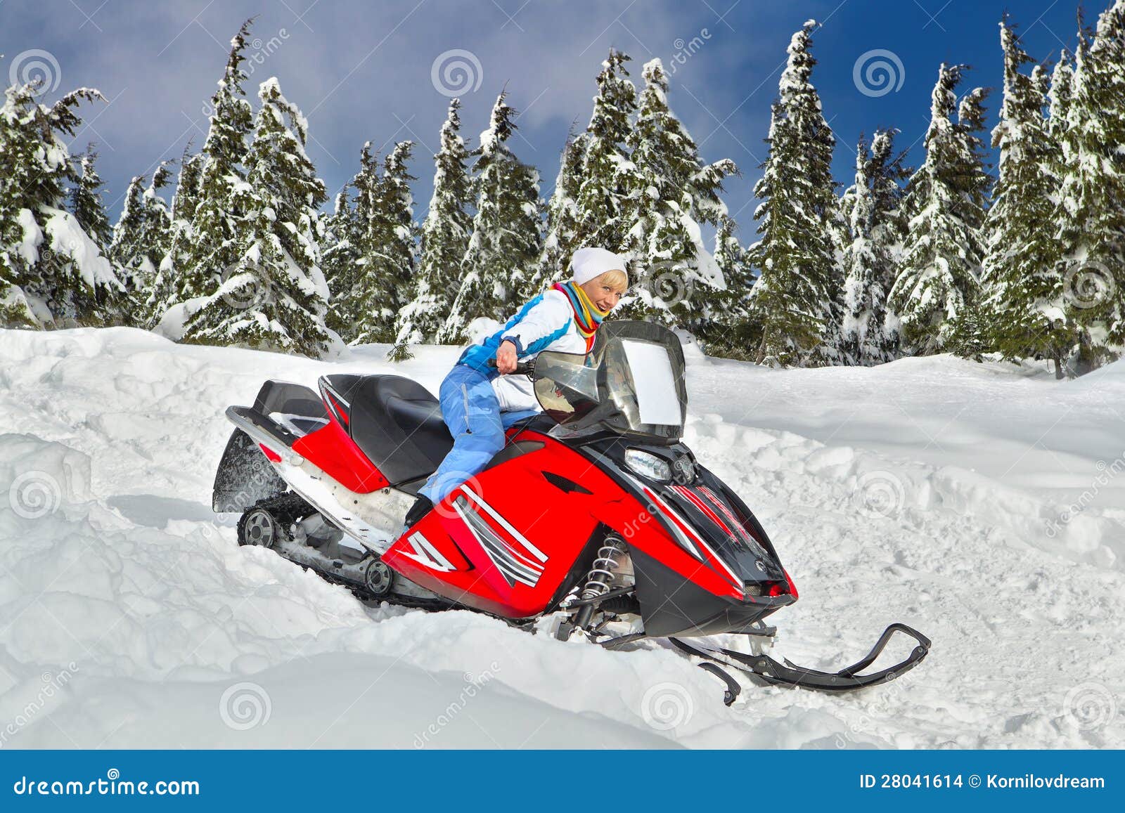 Woman riding a snowmobile stock photo. Image of driver - 28041614