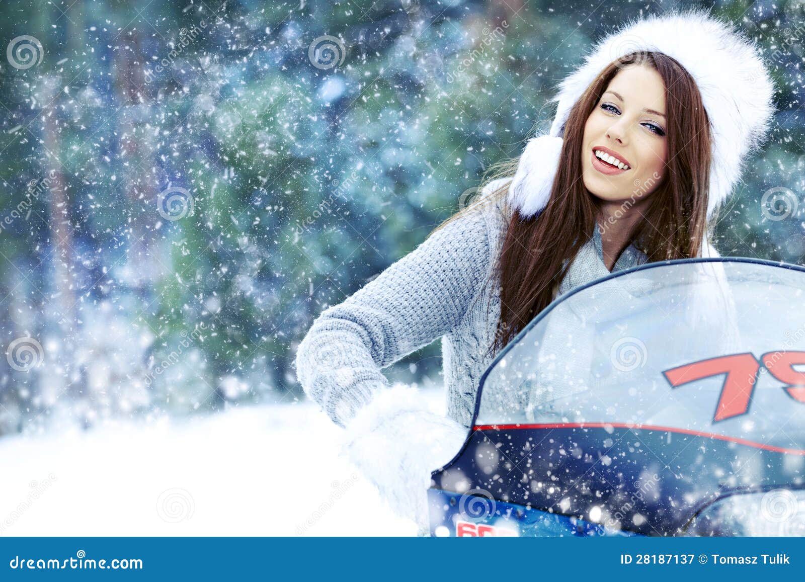 Woman riding a snowmobile stock image. Image of people - 28187137