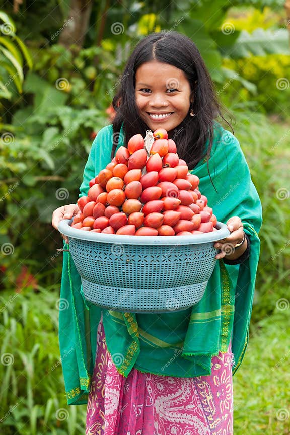 Woman with ripe fruit stock photo. Image of person, asia - 24487814