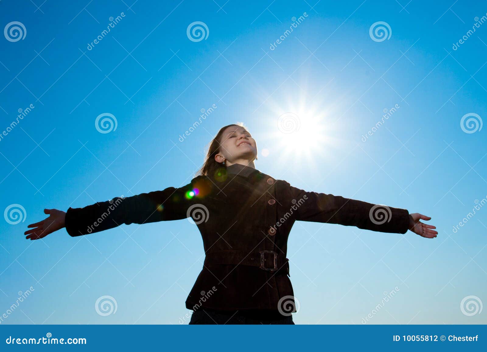 Woman rising hands stock photo. Image of pretty, sunshine - 10055812