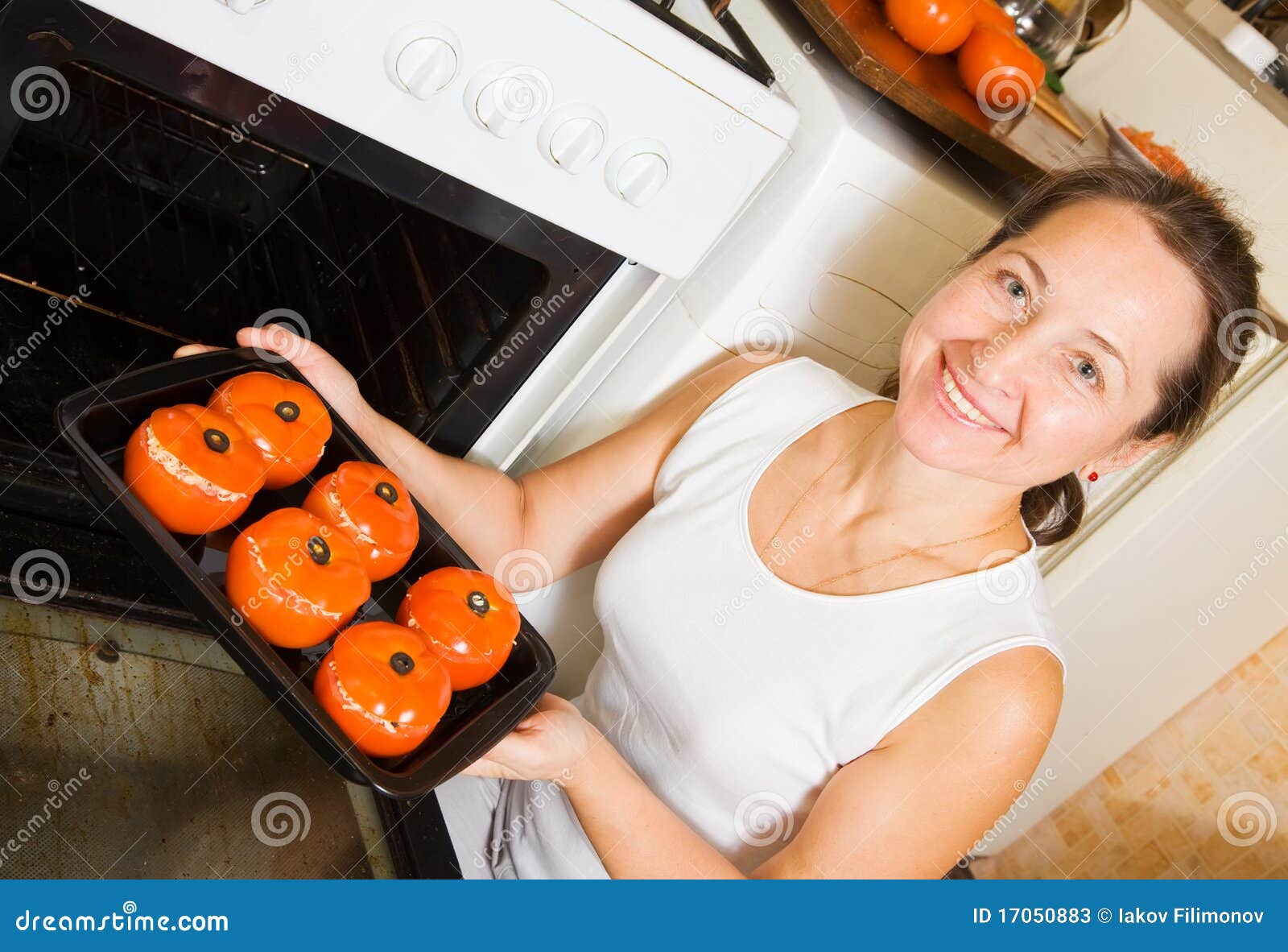 Woman Roasting Farci Tomato Stock Image - Image of closeup, forced ...