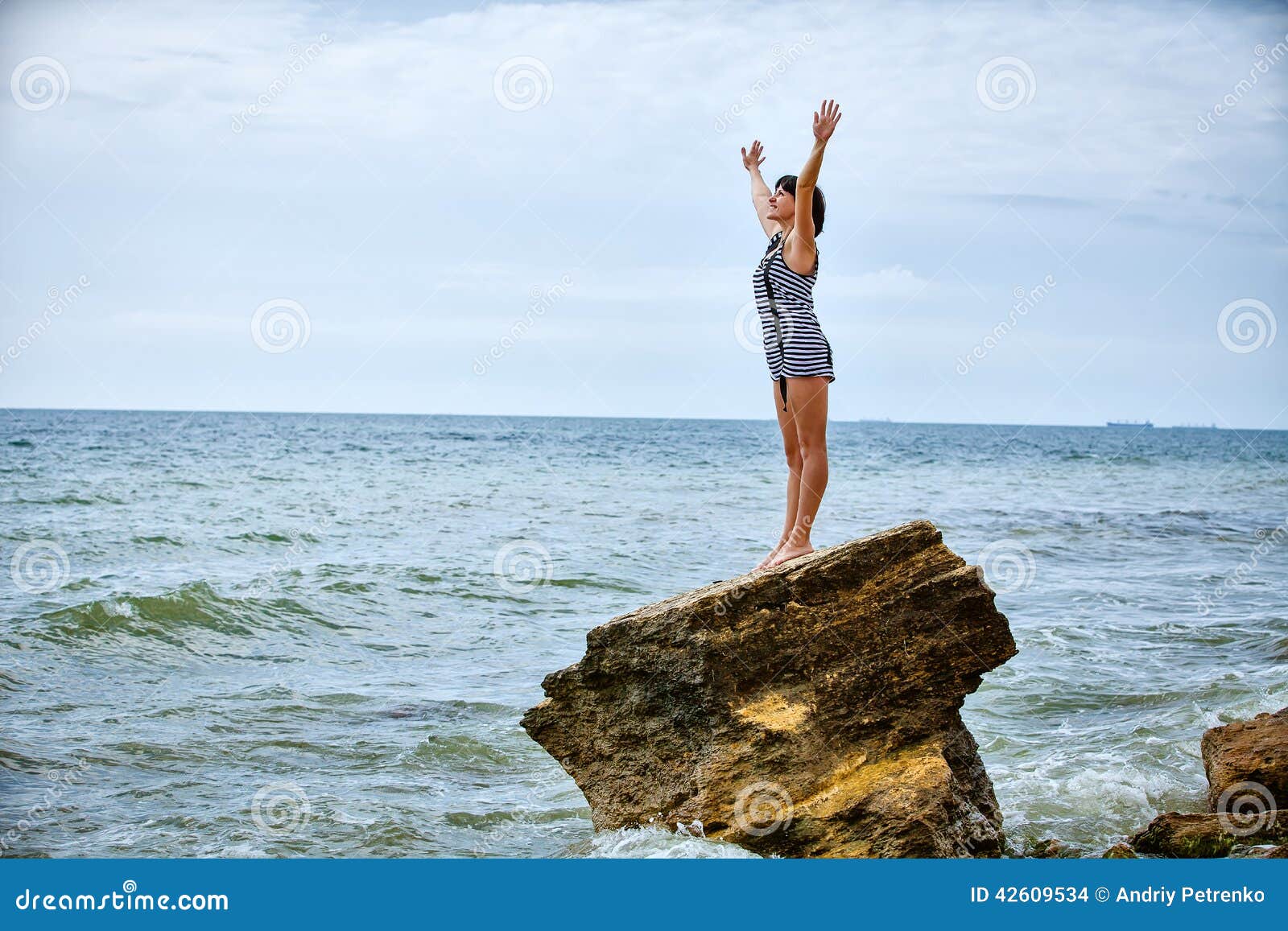 Woman on rock in beach stock photo. Image of lifestyle - 42609534