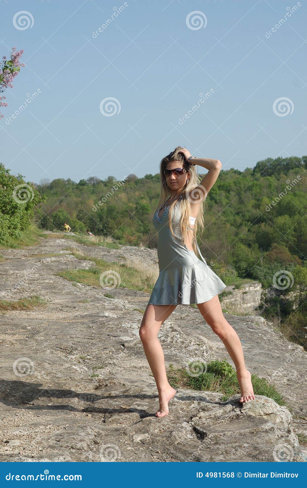 Woman on rocks stock photo. Image of teen, rural, dress - 4981568