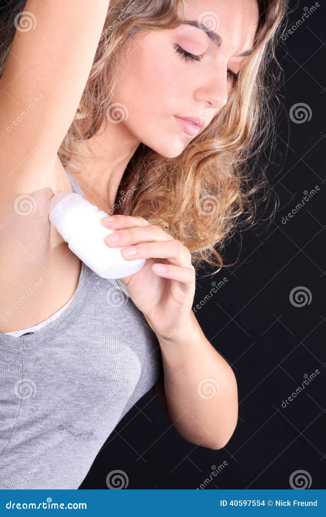 Woman with Roll-on Deodorant Stock Photo - Image of close, fresh: 40597554