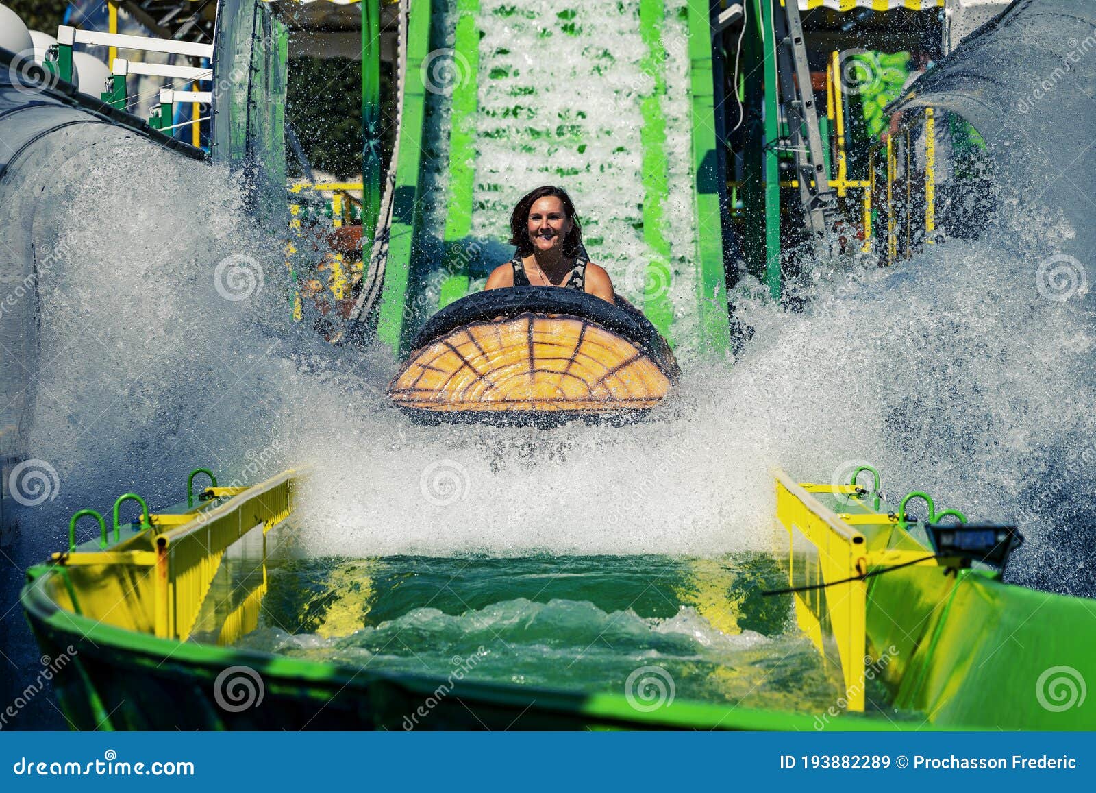 Woman on roller coaster stock image. Image of action - 193882289