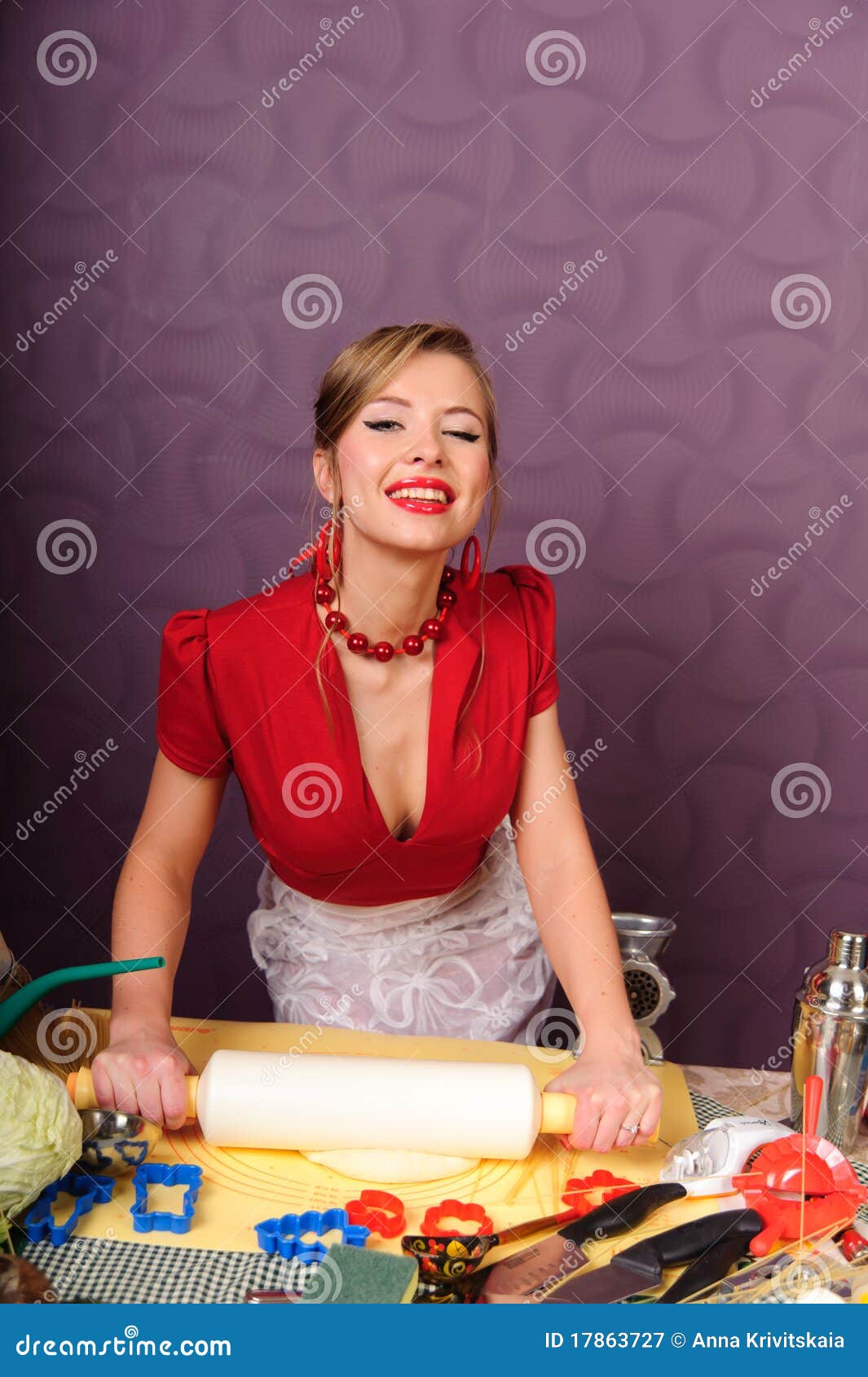 Woman Rolling Dough stock image. Image of caucasian, dress - 17863727
