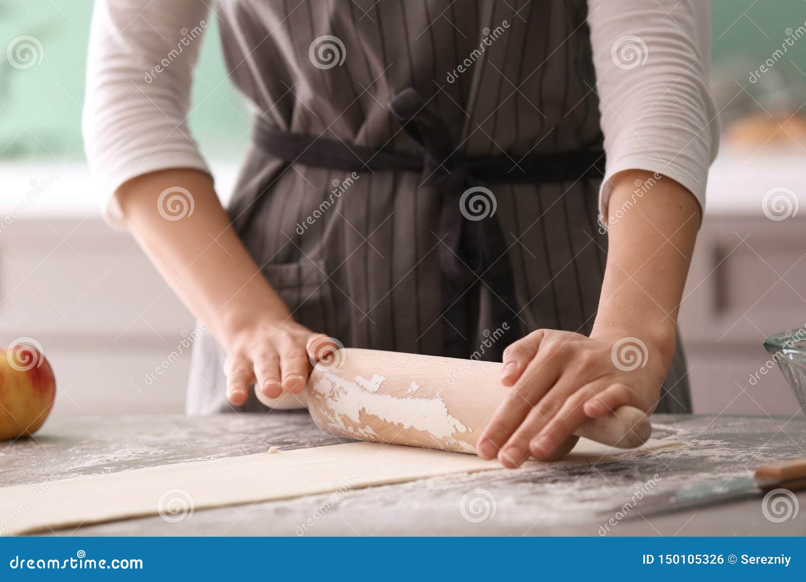 Woman Rolling Out Dough in Kitchen Stock Photo - Image of female ...