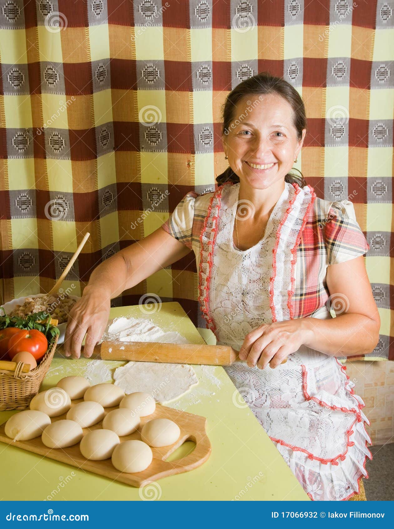 Woman with rolling pin stock photo. Image of kitchen - 17066932
