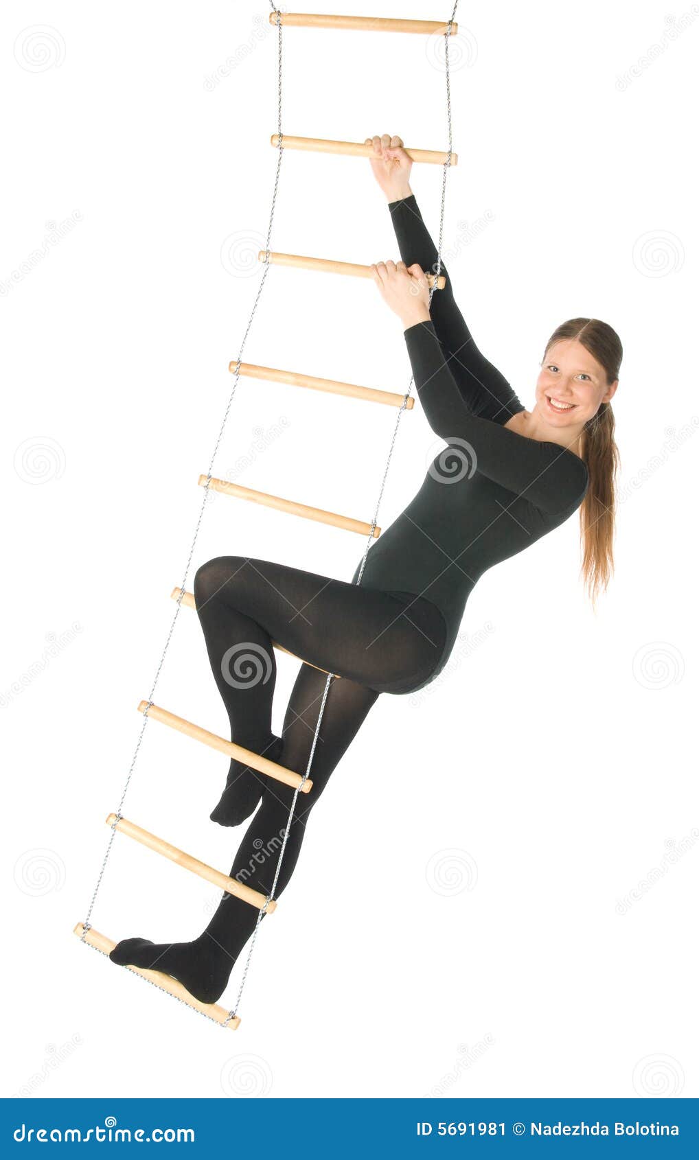 Woman on a rope ladder stock image. Image of action, body - 5691981
