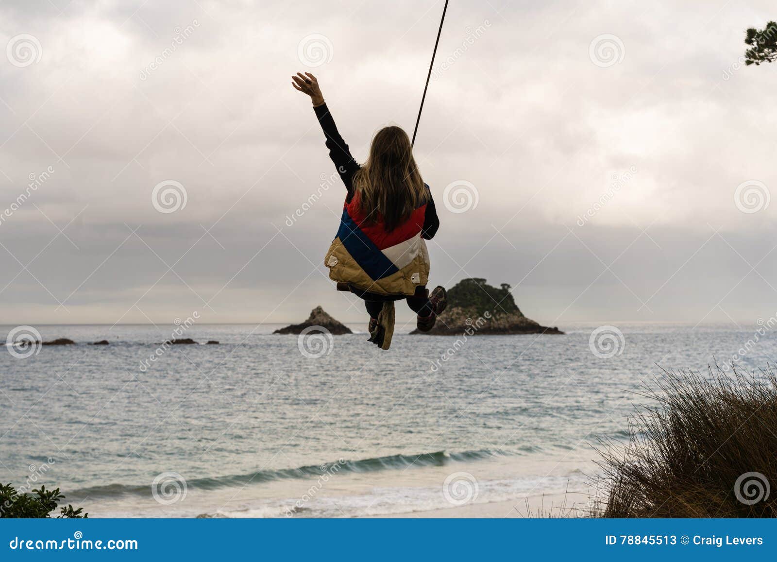 Woman on Rope Swing stock image. Image of jumping, vacation - 78845513