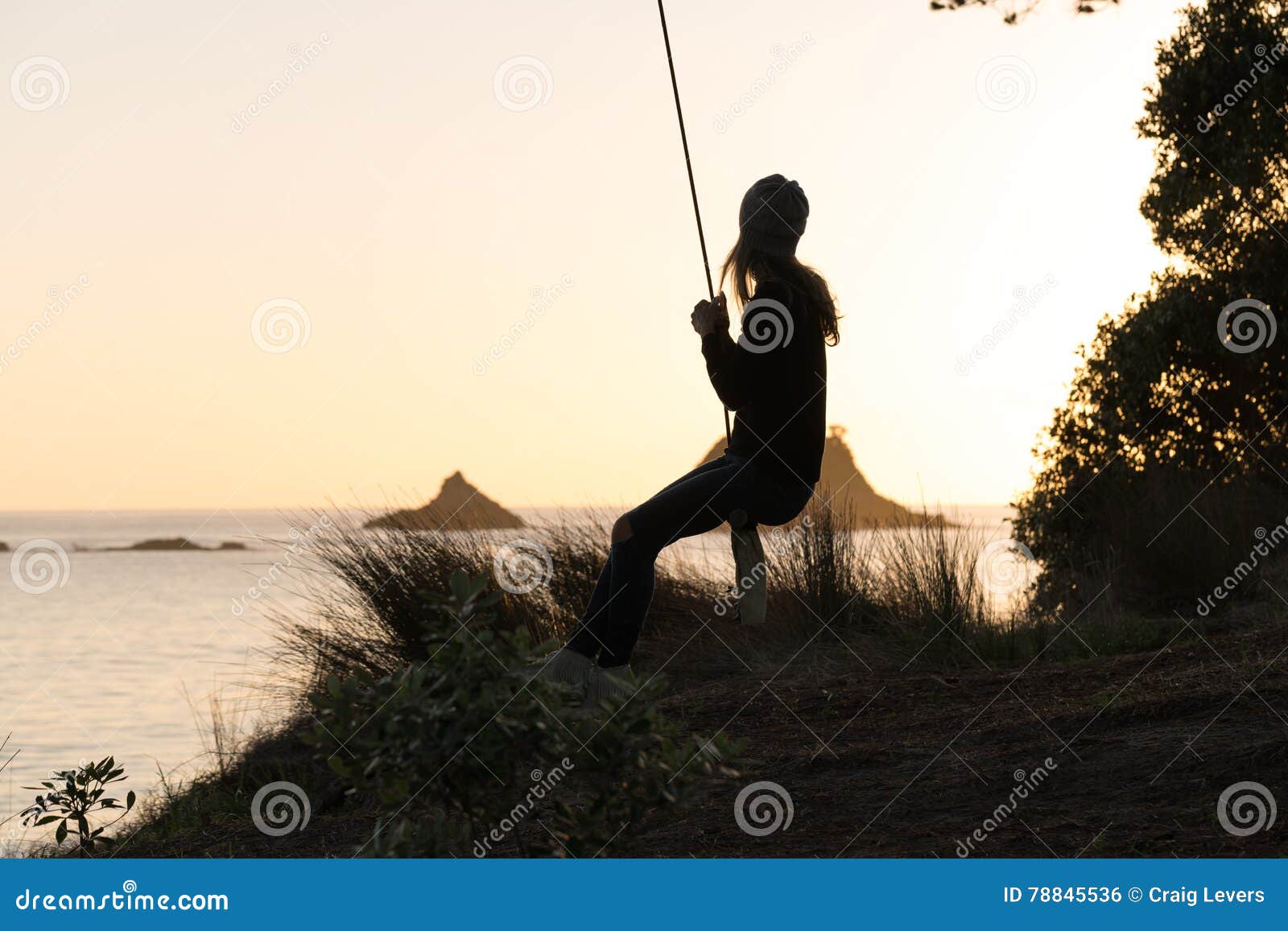 Woman on Rope Swing stock photo. Image of swing, active - 78845536