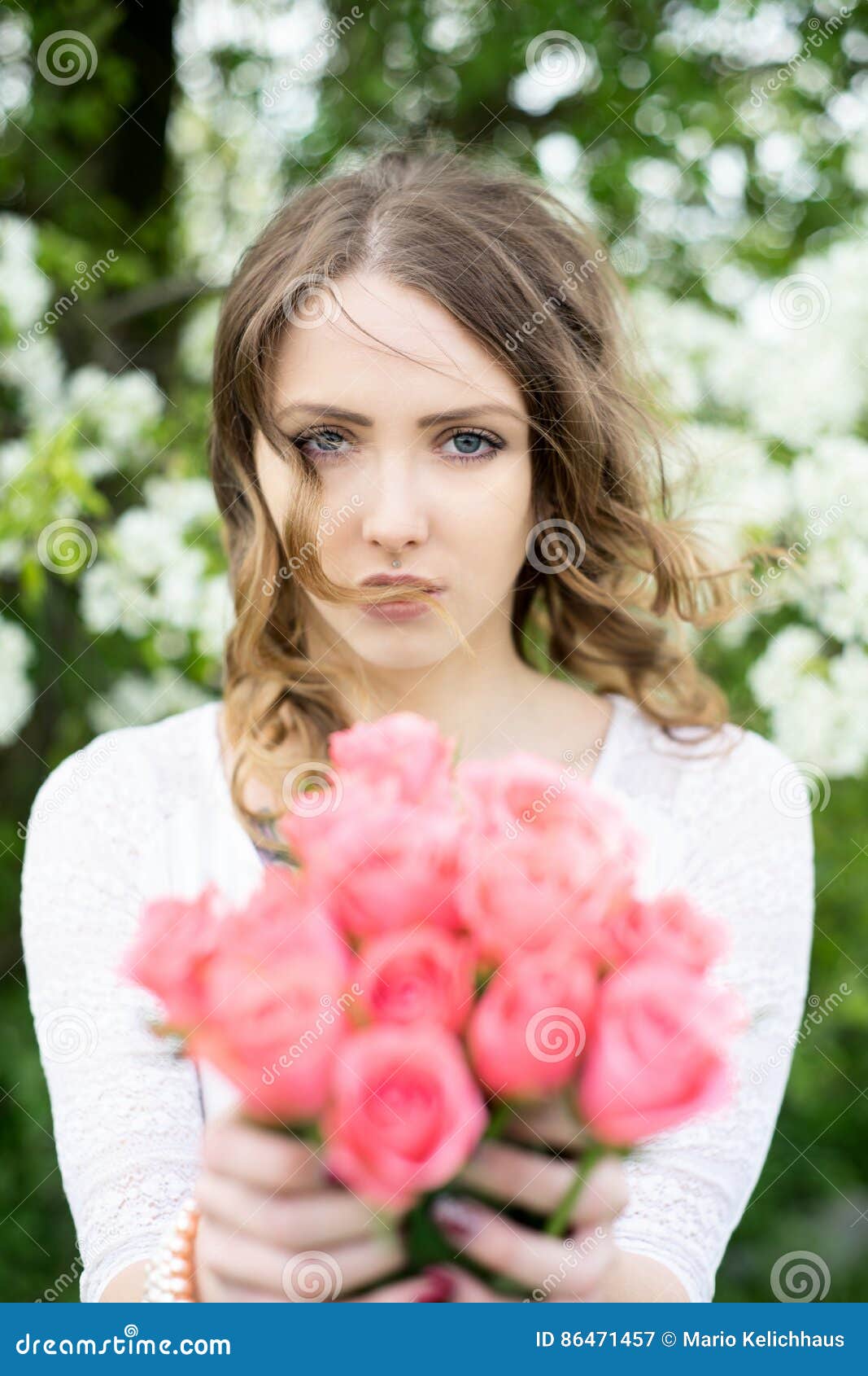 Woman with roses stock image. Image of romance, emotions - 86471457