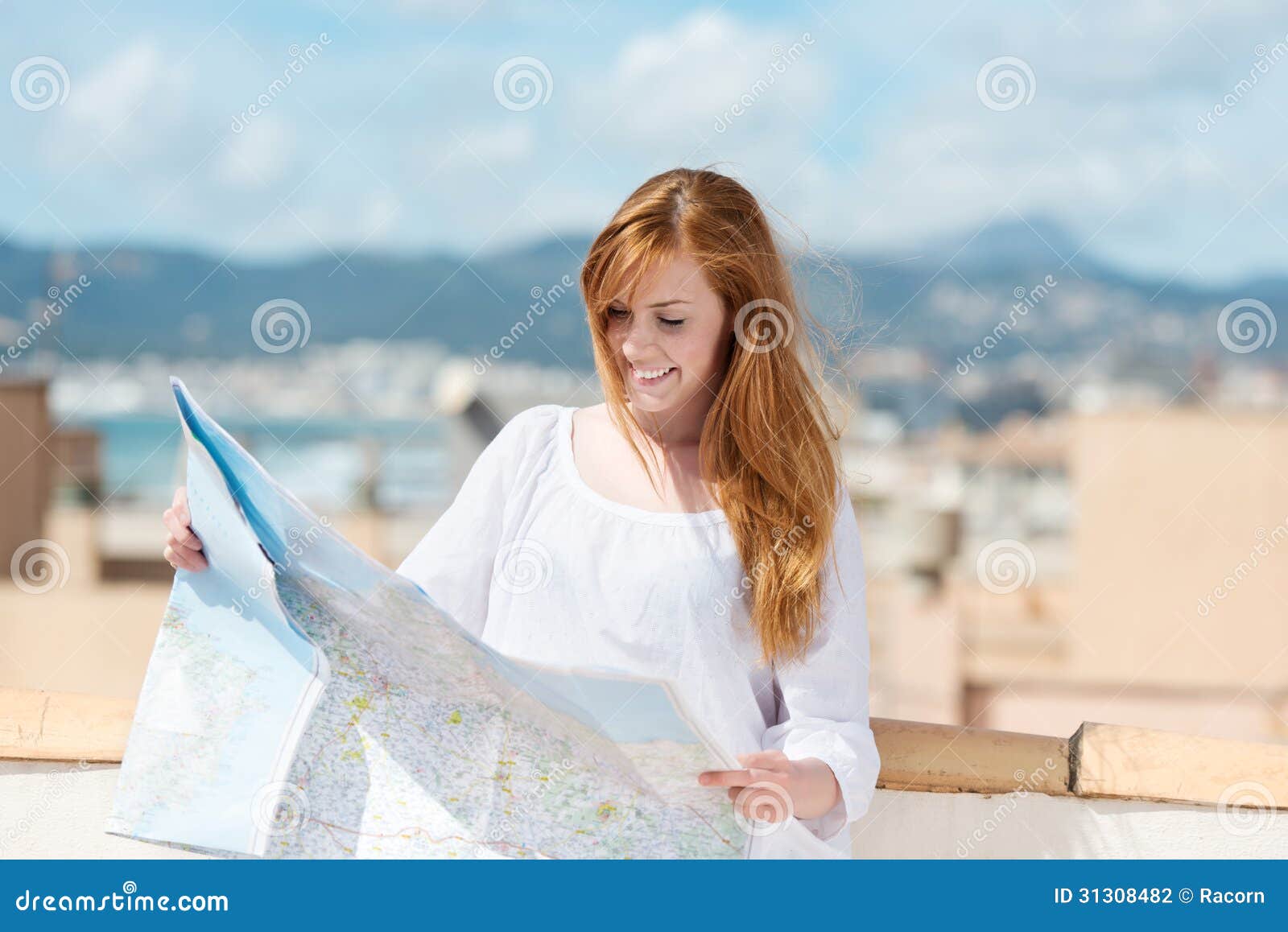 Woman with a route map stock photo. Image of hold, redhead - 31308482