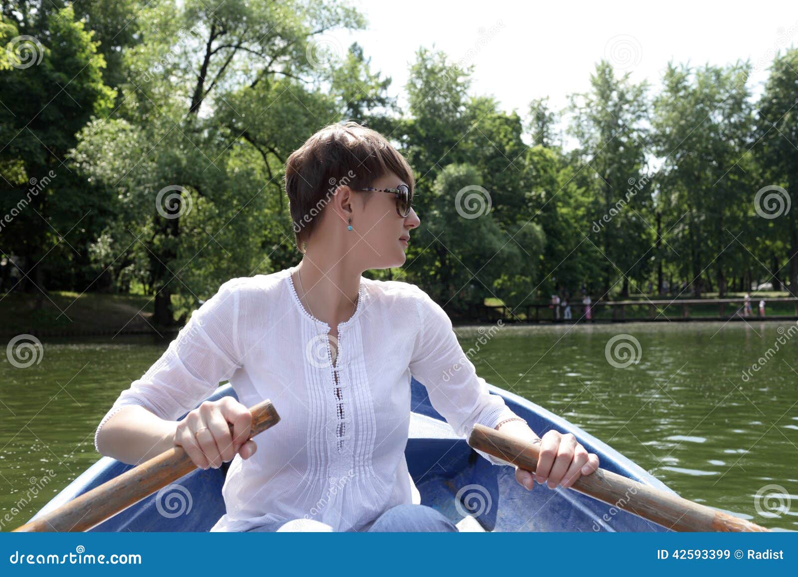 Woman rowing boat stock image. Image of action, kayak - 42593399