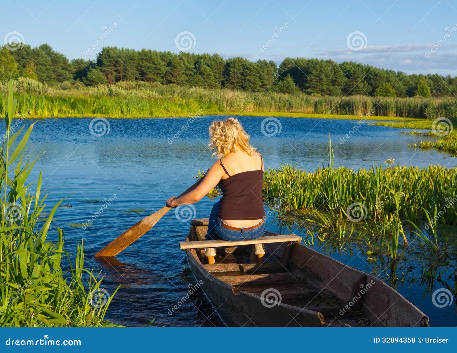 Woman rowing on river stock photo. Image of countryside - 32894358
