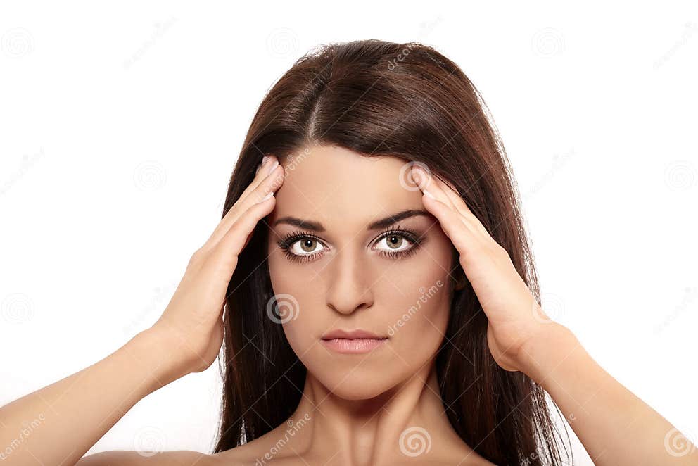 Woman rubbing forehead stock image. Image of patient - 21087839