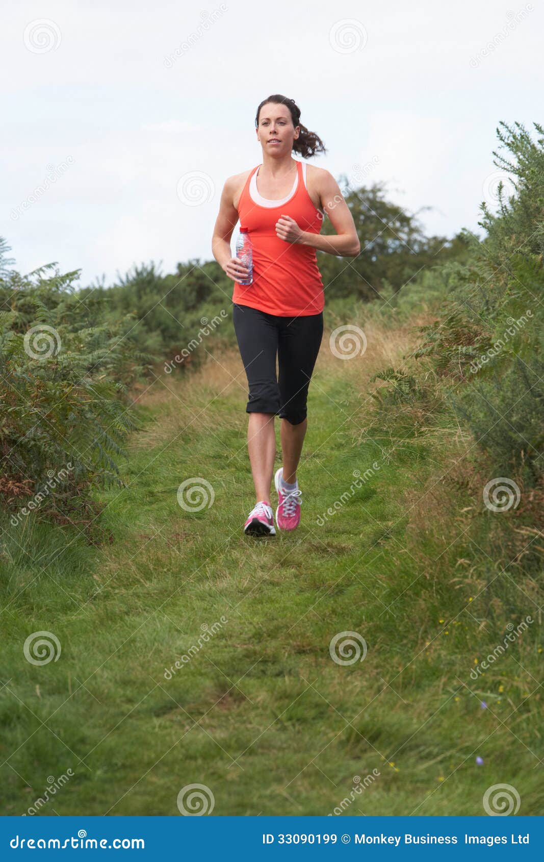 Woman on Run in Countryside Stock Image - Image of path, clothing: 33090199