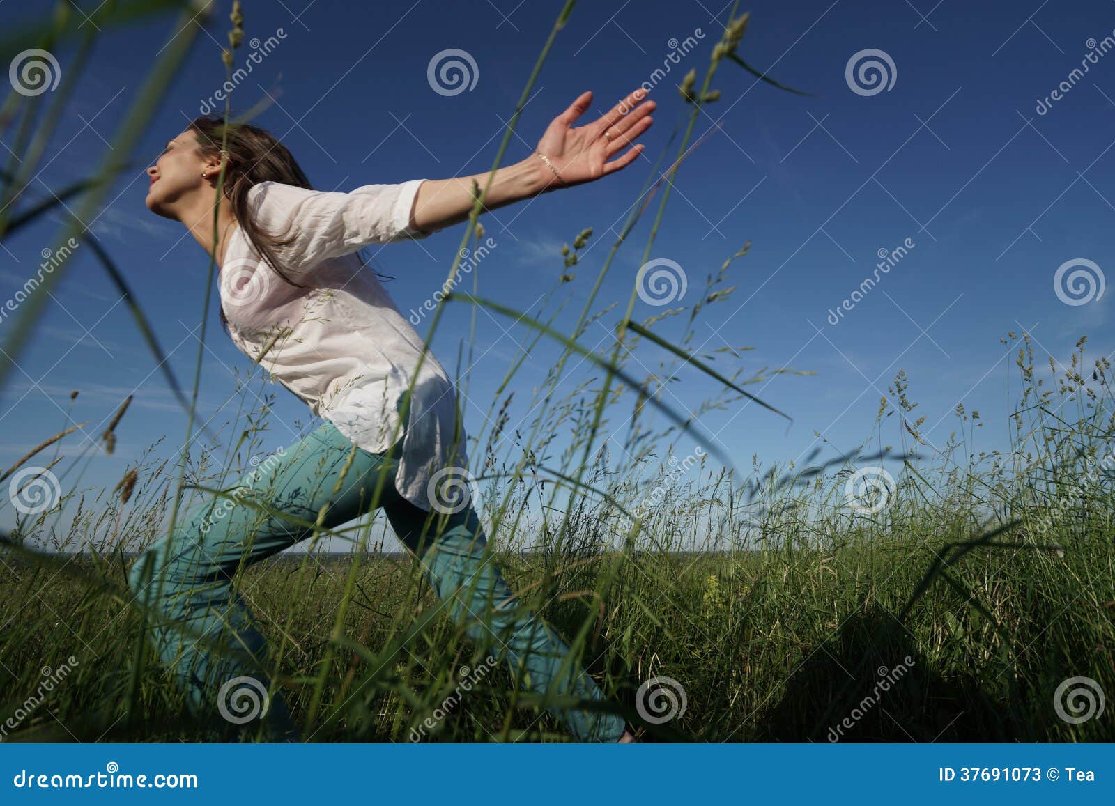Woman run through grass stock image. Image of enjoyment - 37691073