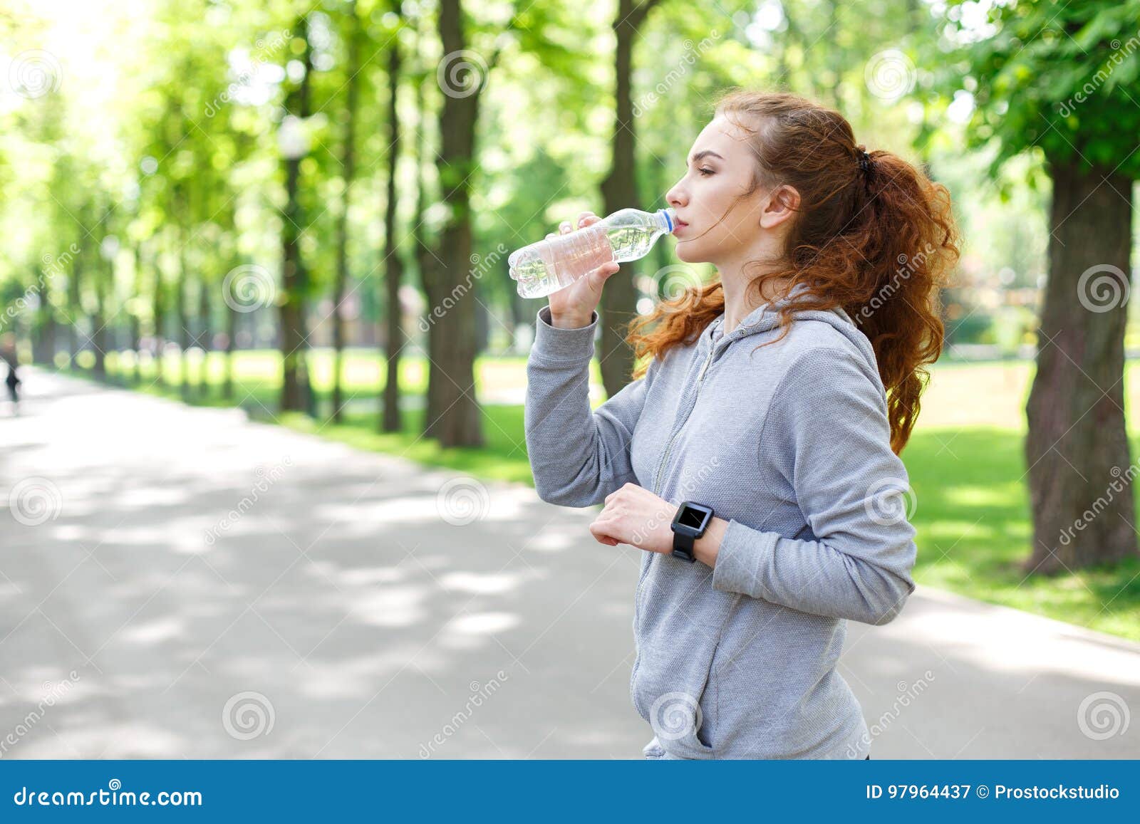 Woman Runner is Having Break, Drinking Water Stock Image - Image of ...