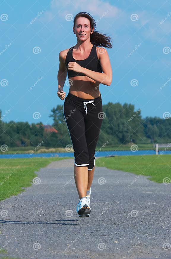 Woman running stock image. Image of marathon, female, people - 1100051
