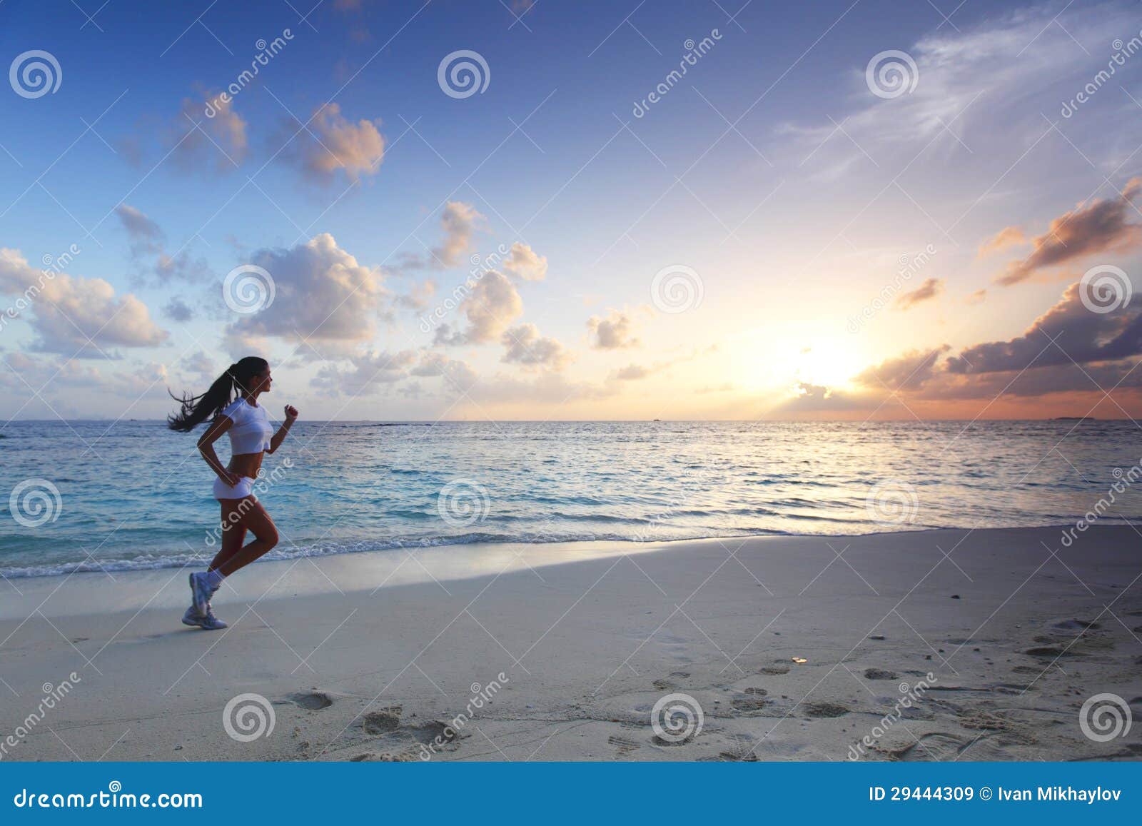 Woman running on beach stock image. Image of outside - 29444309