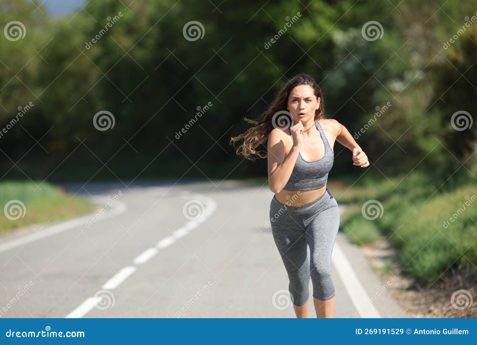 Woman Running Fast on a Road Stock Image - Image of mountain, marathon ...