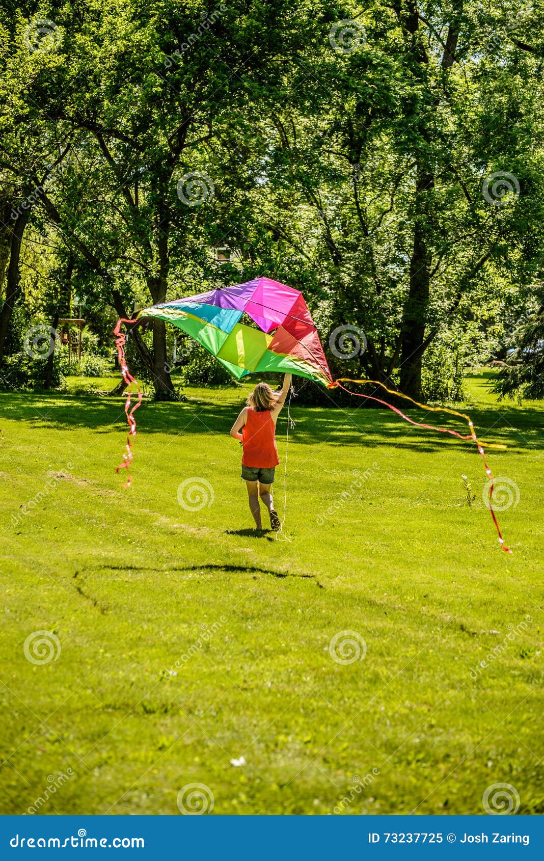 Woman Running and Flying Colorful Kite Stock Image - Image of caucasian ...