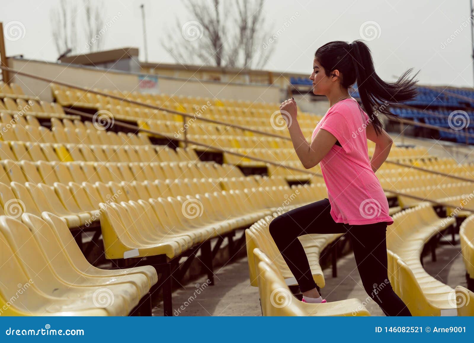 Woman running in ground stock image. Image of caucasian - 146082521