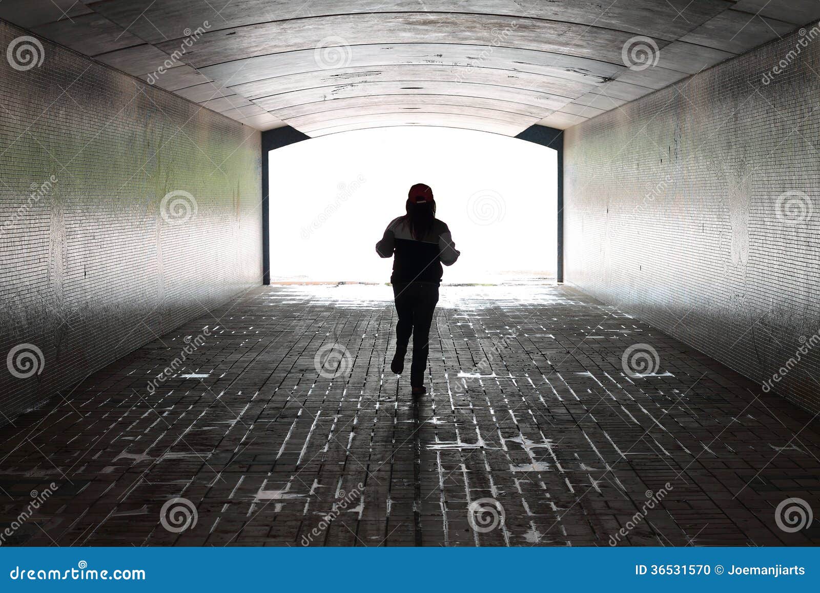 Woman Running Inside a Tunnel Stock Photo - Image of light, security ...