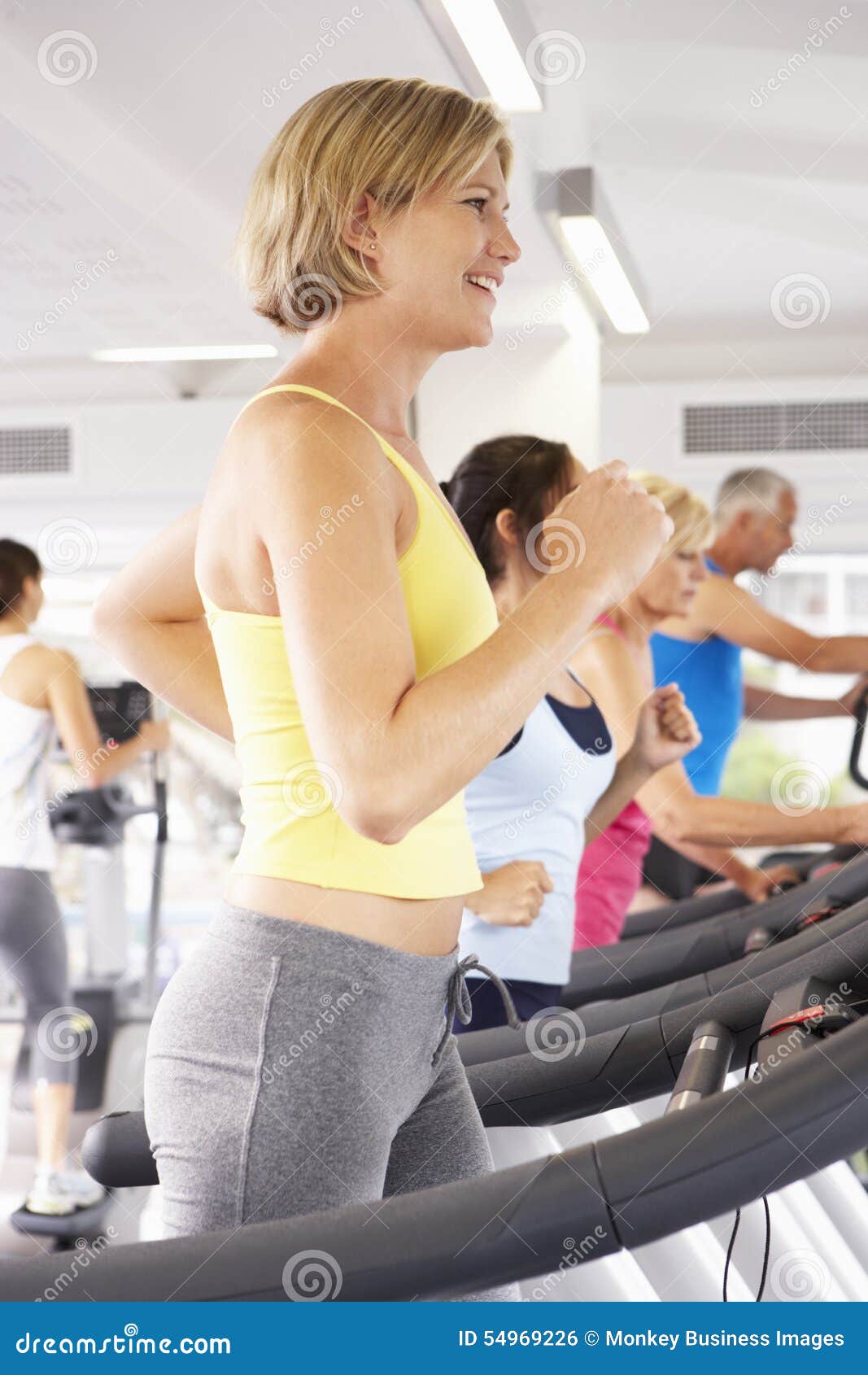Woman on Running Machine in Gym Stock Photo - Image of women, trainer ...