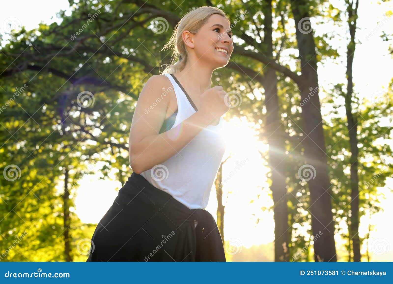 Woman Running Outdoors in Morning, Low Angle View Stock Image - Image ...