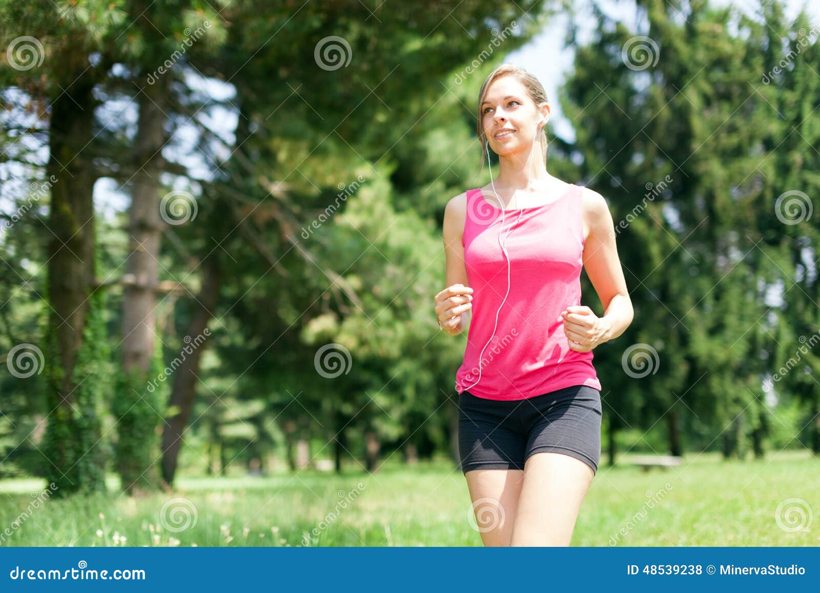 Woman running outdoors stock photo. Image of grass, healthy - 48539238