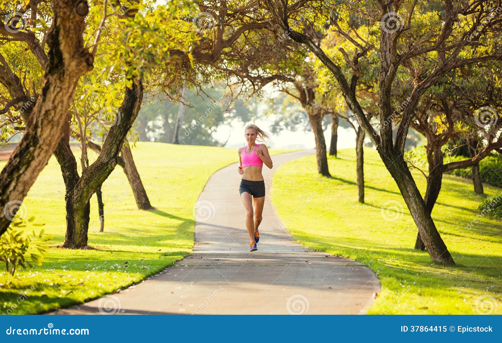 Woman running in the park stock image. Image of healthy - 37864415