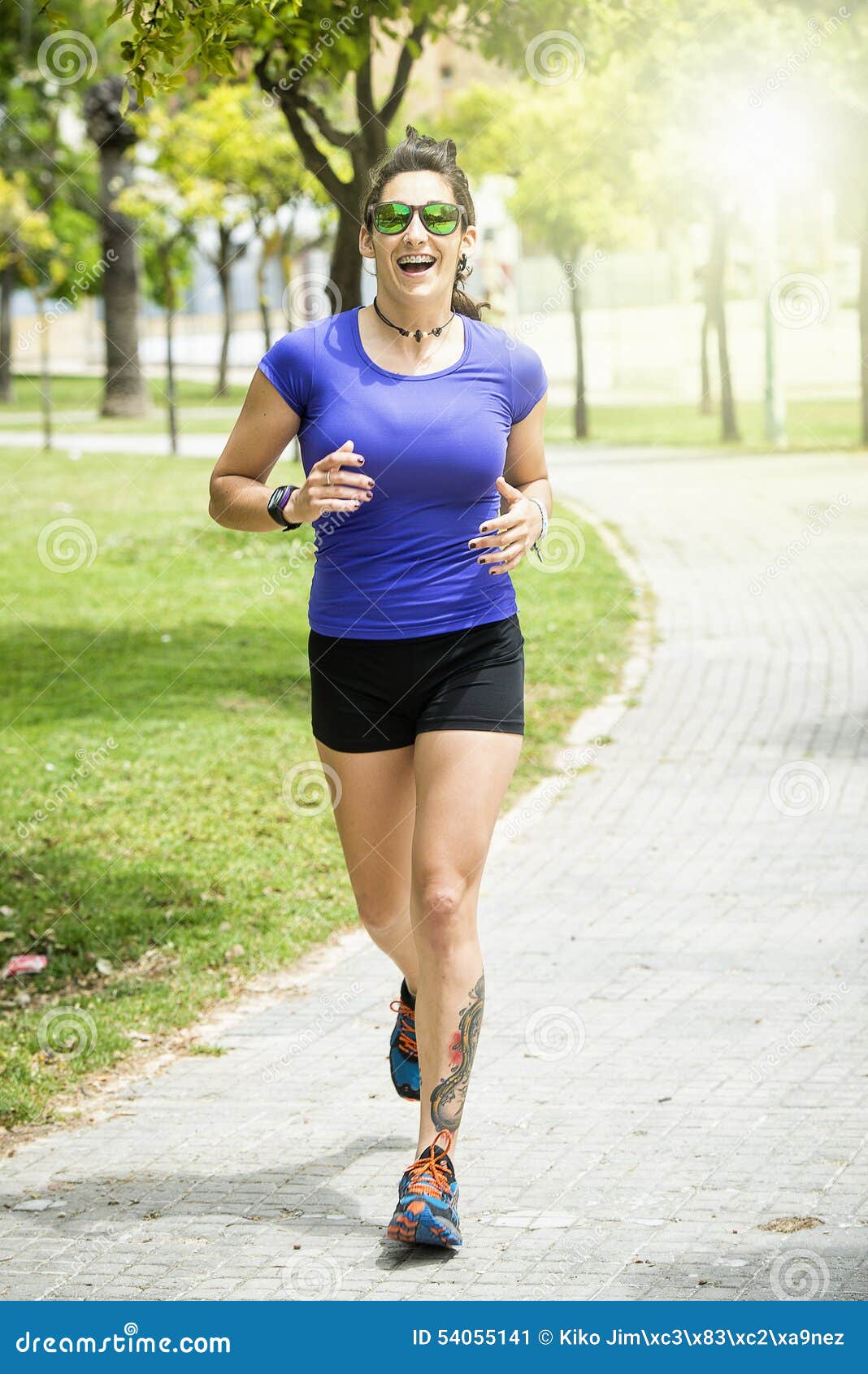 Woman running in the park stock image. Image of summer - 54055141