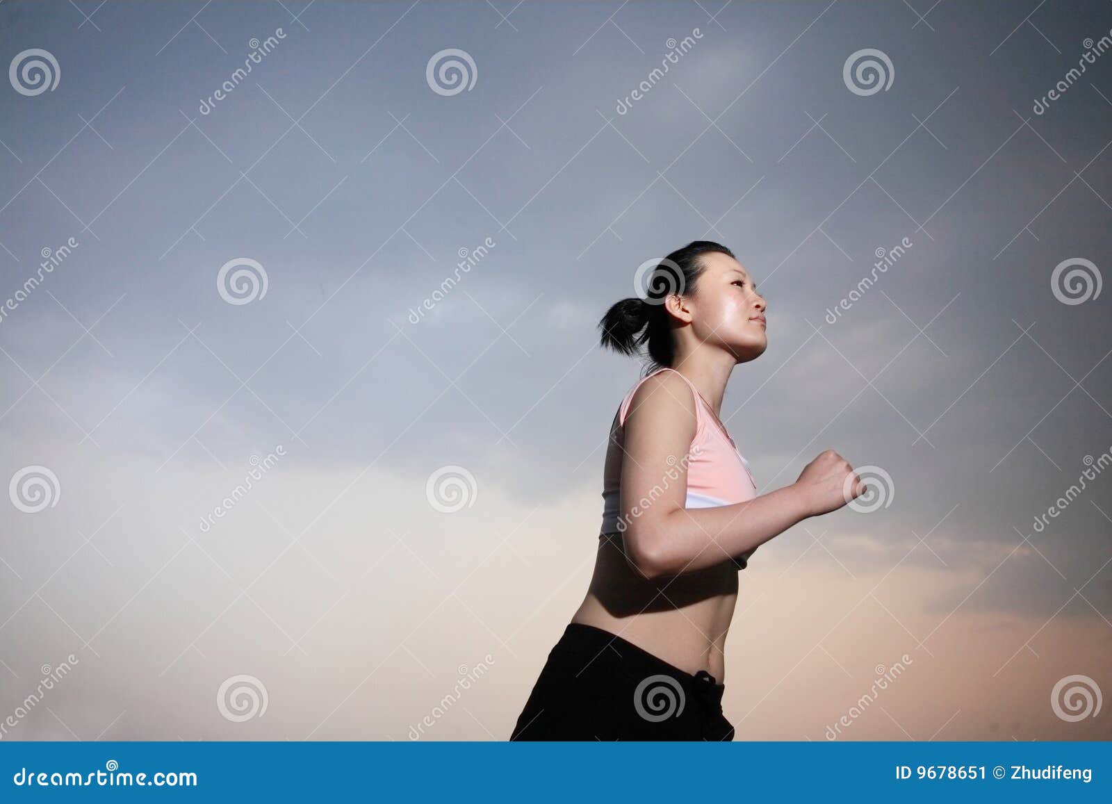 Woman running with sunset stock image. Image of outdoor - 9678651