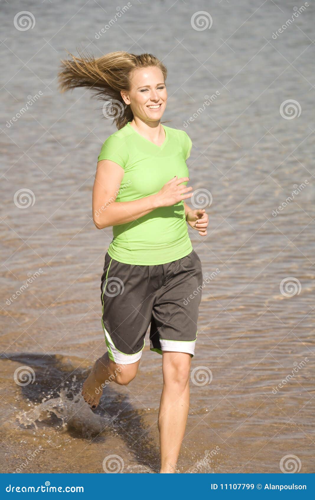 Woman running in water stock image. Image of blowing - 11107799