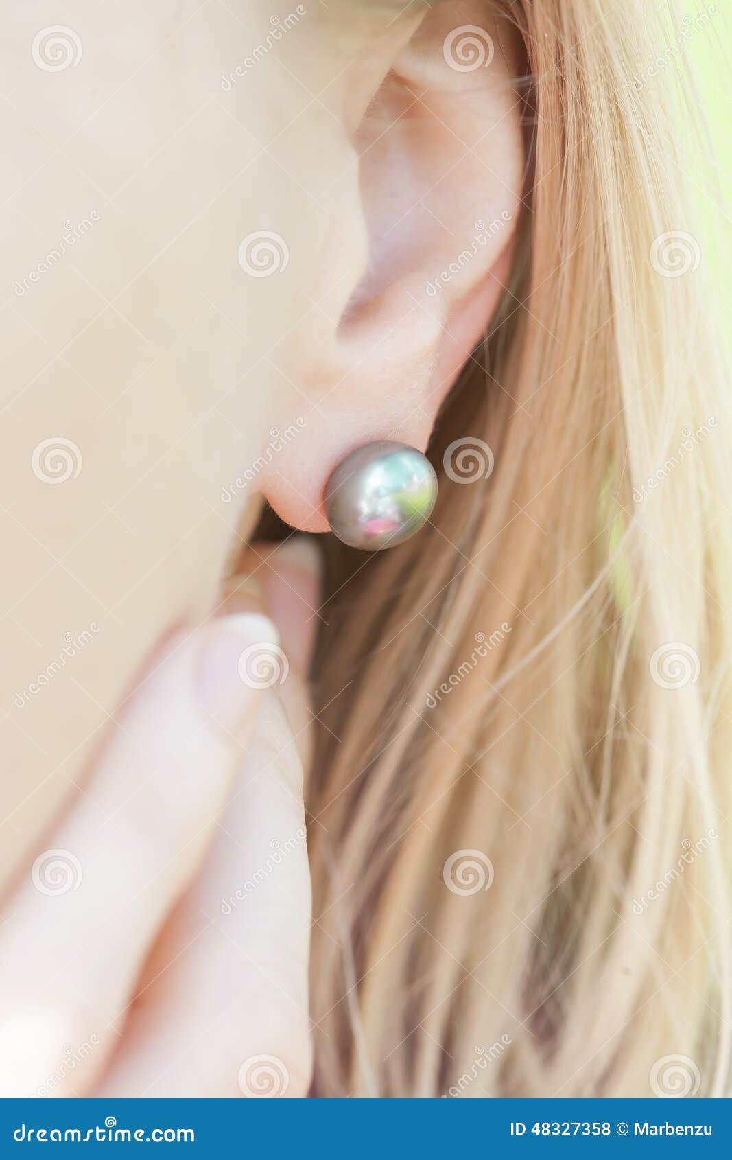 Woman S Ear with a Dark Pearl Earring Stock Photo - Image of chic ...