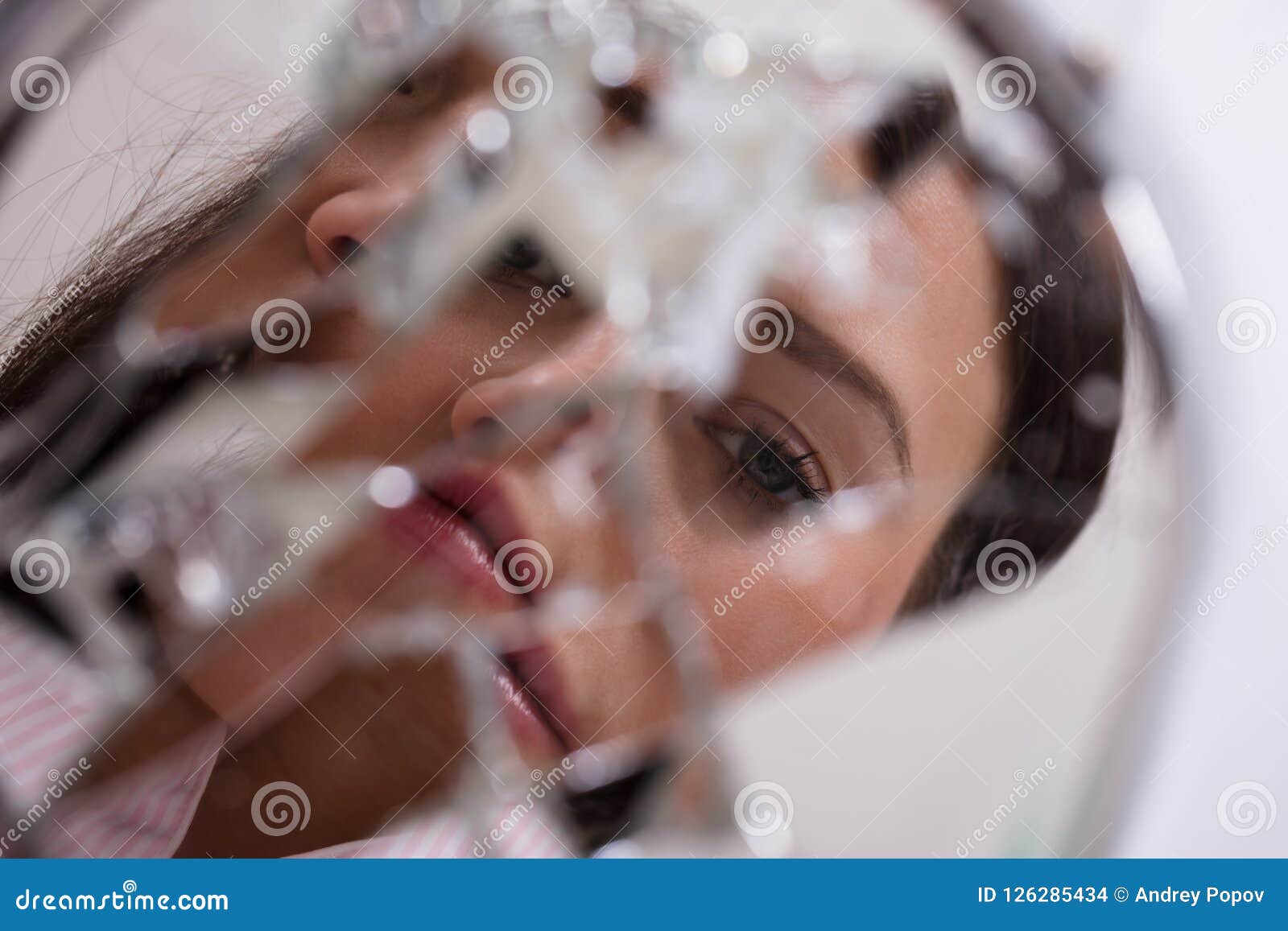 Woman`s Face in Broken Mirror Stock Photo - Image of look, close: 126285434