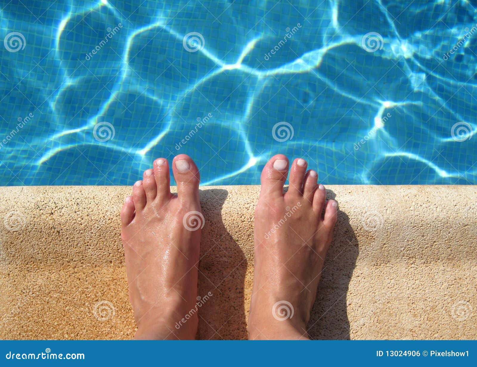 Woman s feet in the pool stock photo. Image of woman - 13024906