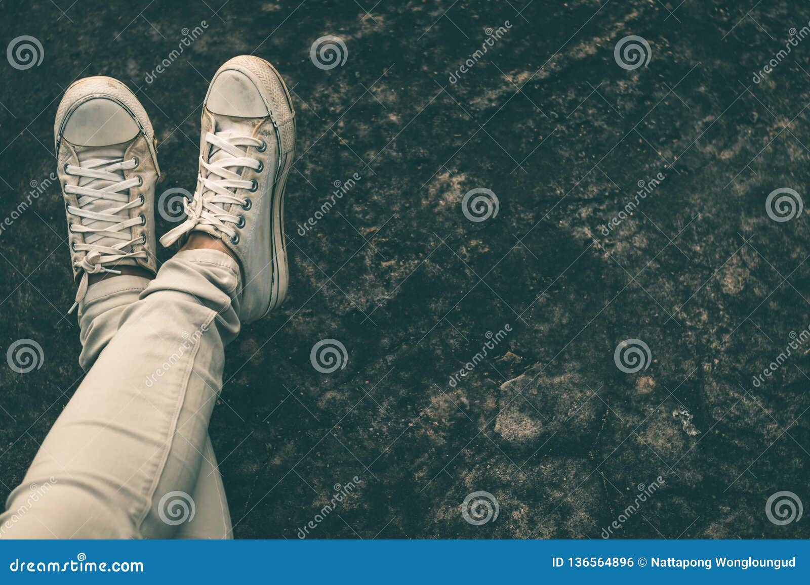 Woman`s feet sit relaxed. stock photo. Image of people - 136564896