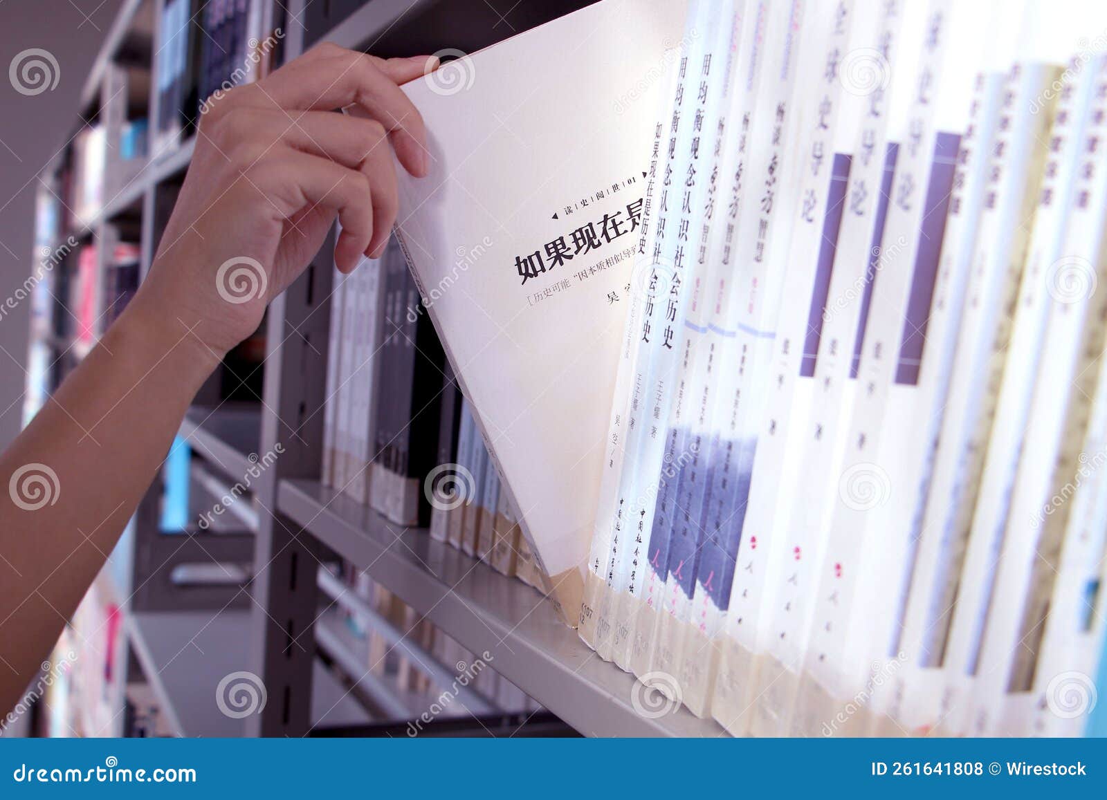 Woman S Hand Choosing a Book in the Library Editorial Stock Photo ...