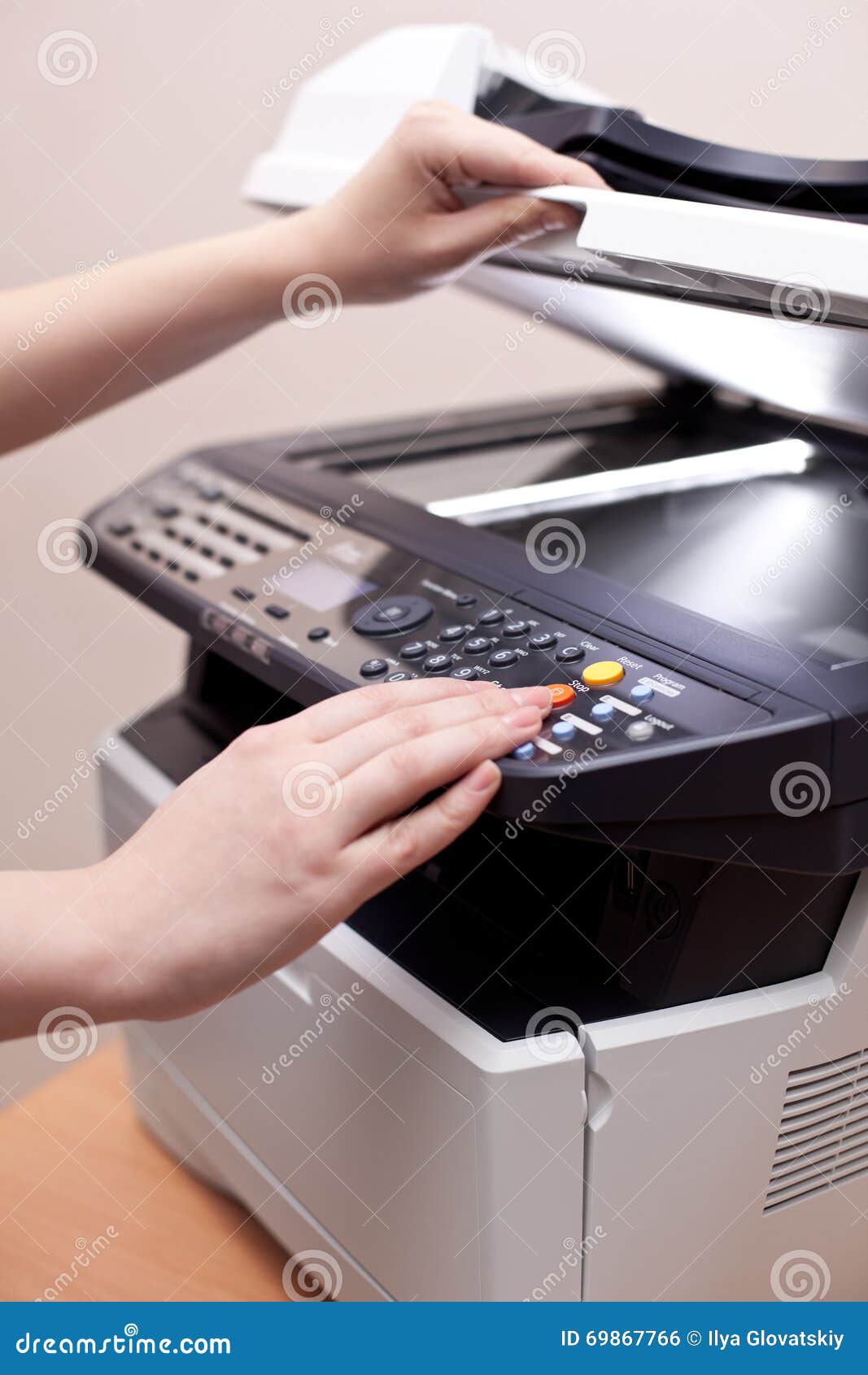 Woman s hand with copier stock photo. Image of laser - 69867766