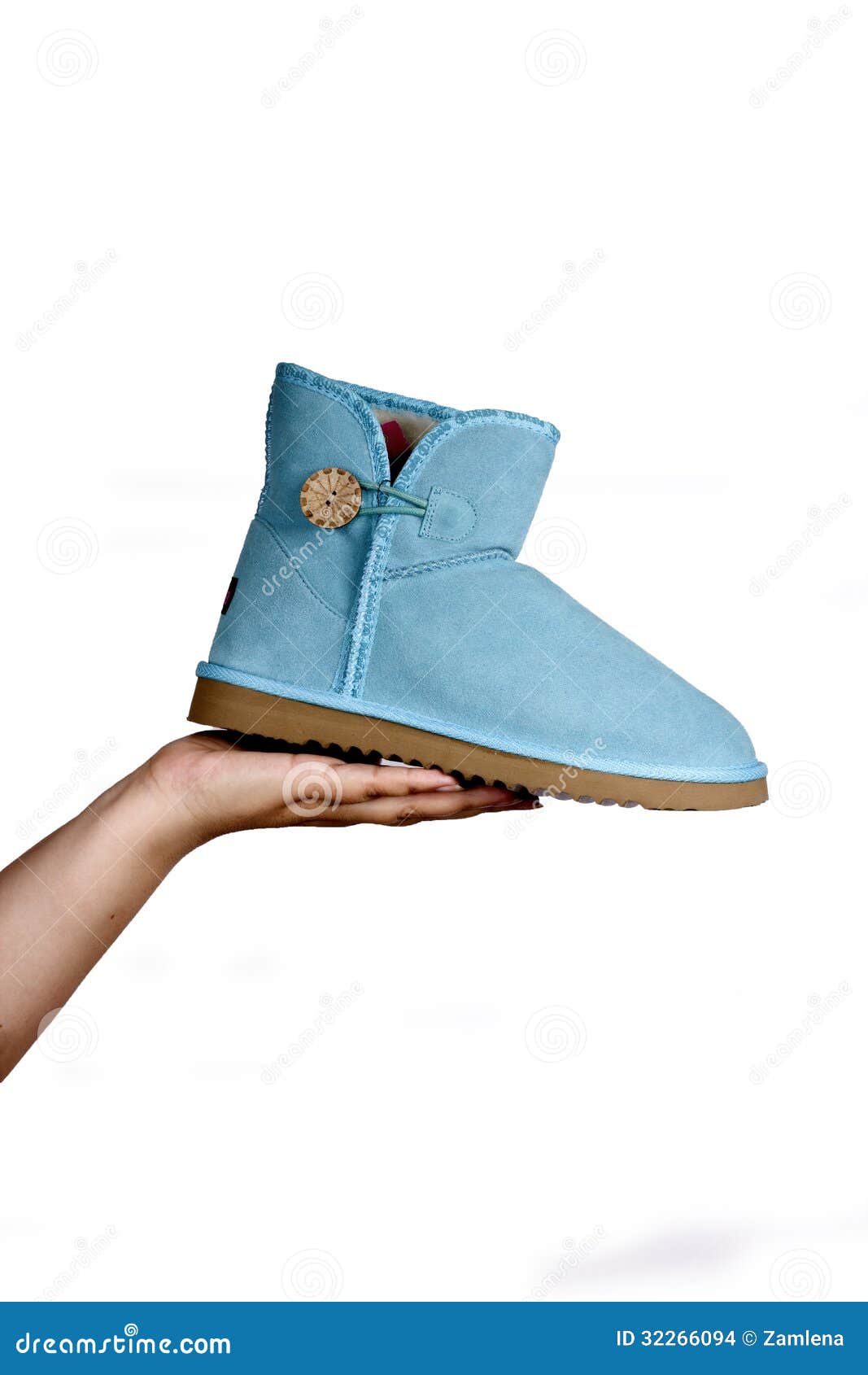 Woman S Hand Holding Ablue Boot Stock Photo - Image of black, winter ...